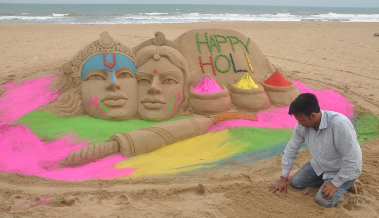 Odisha artist creates sand art on Radha-Krishna for Holi