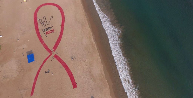 Sudarsan attempts for world record creating largest Red Ribbon sand art